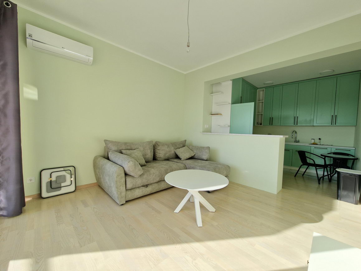 One bedroom modern apartment 51m2, with a partial view of the sea. Becici